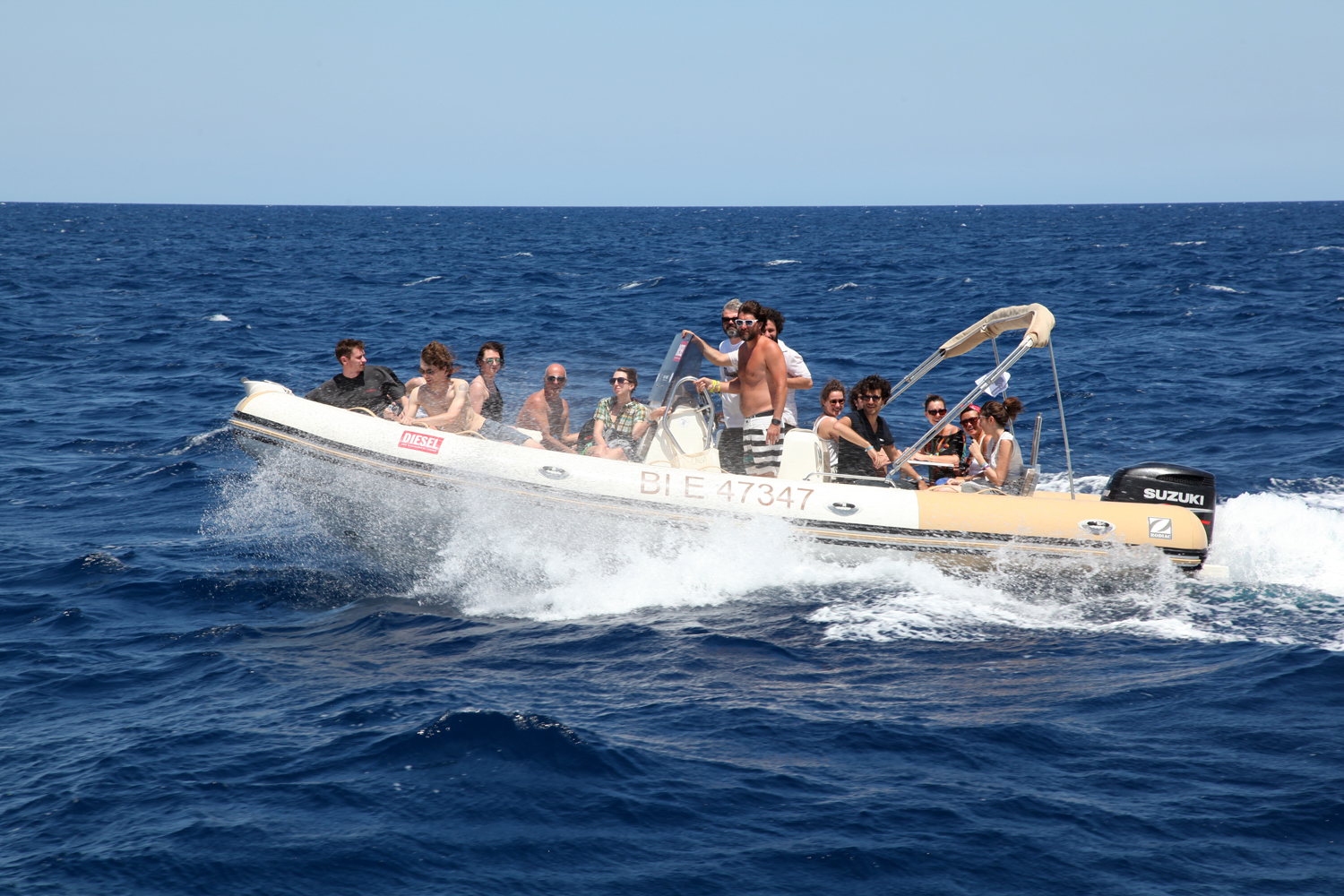A day on the Diesel Monster Boat in Calvi, Corsica - purple TRAVEL