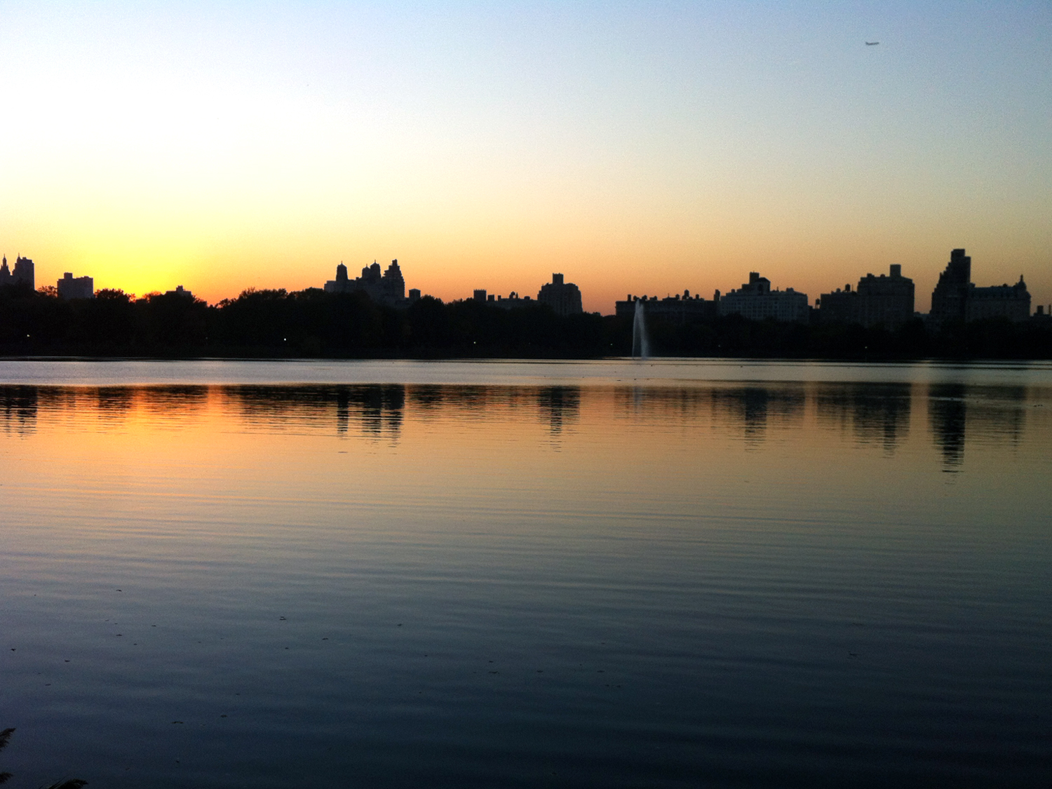 A beautiful fall sunset over the Upper West side in Central park ...
