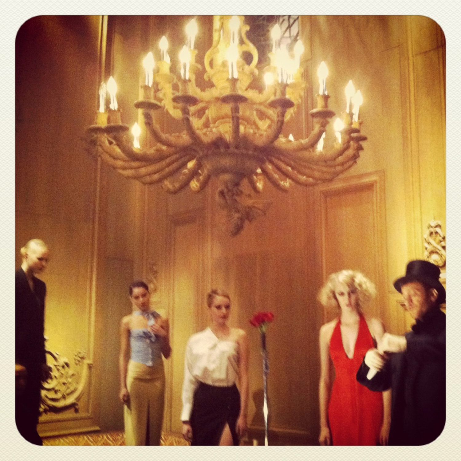 A magician performing at the Imitation F/W 2012 presentation, New York ...