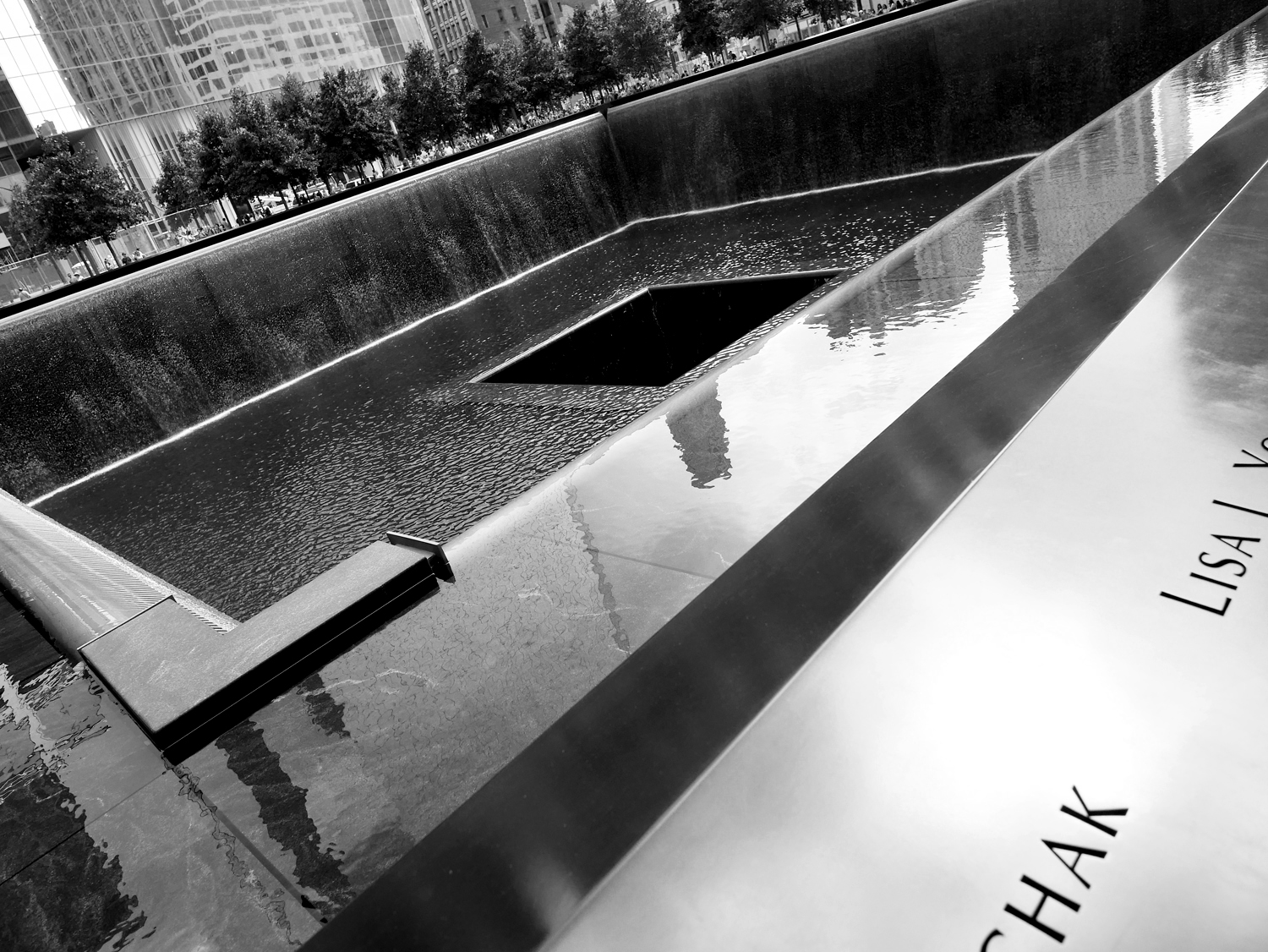 The reflecting pool at the National September 11th Memorial, New York ...