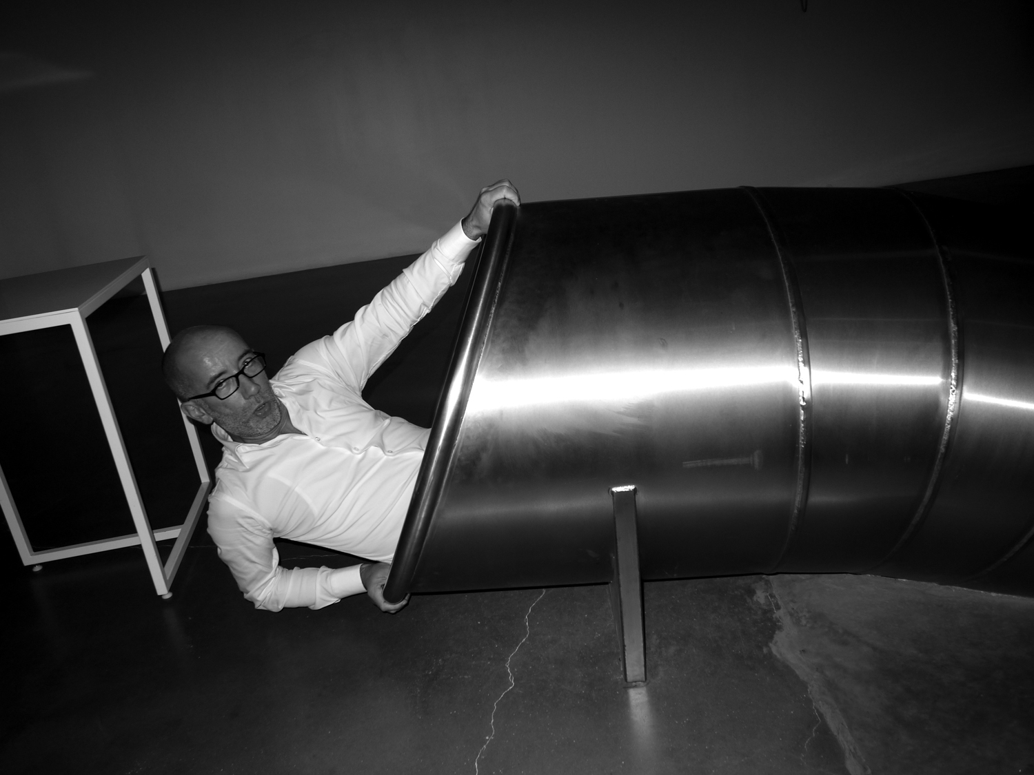 Artist Carsten Holler with one of his work Untitled (Slide) at his show ...
