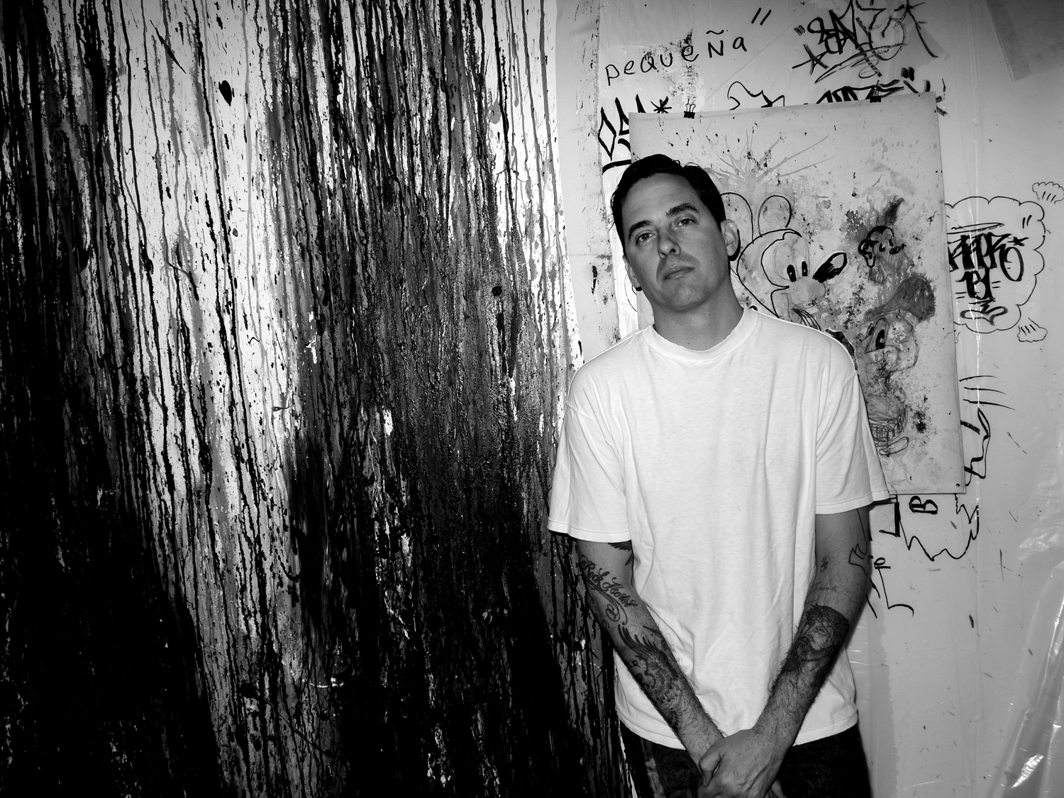 Erik Foss at his studio in front of one of his September... - purple DIARY