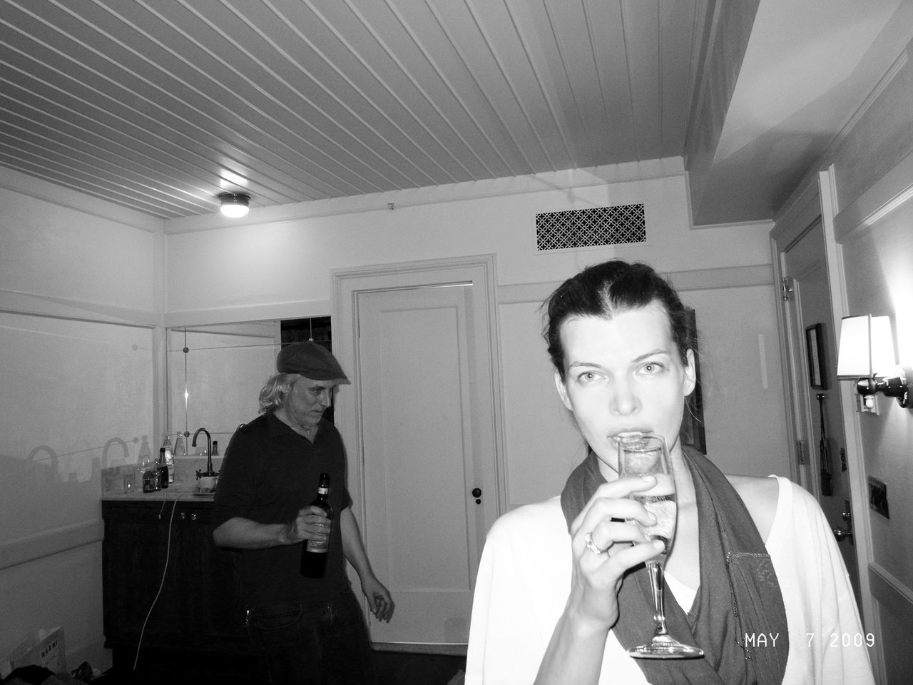 Chris Brenner and Milla Jovovich at the Bowery Hotel, New York. Photo ...