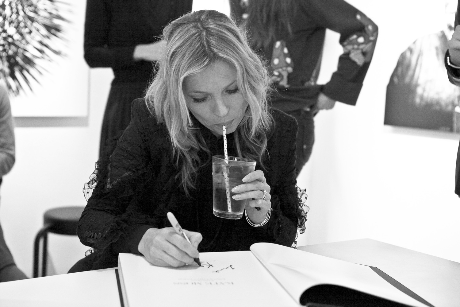 The Kate Moss Book signing at Colette, Paris - purple NIGHT