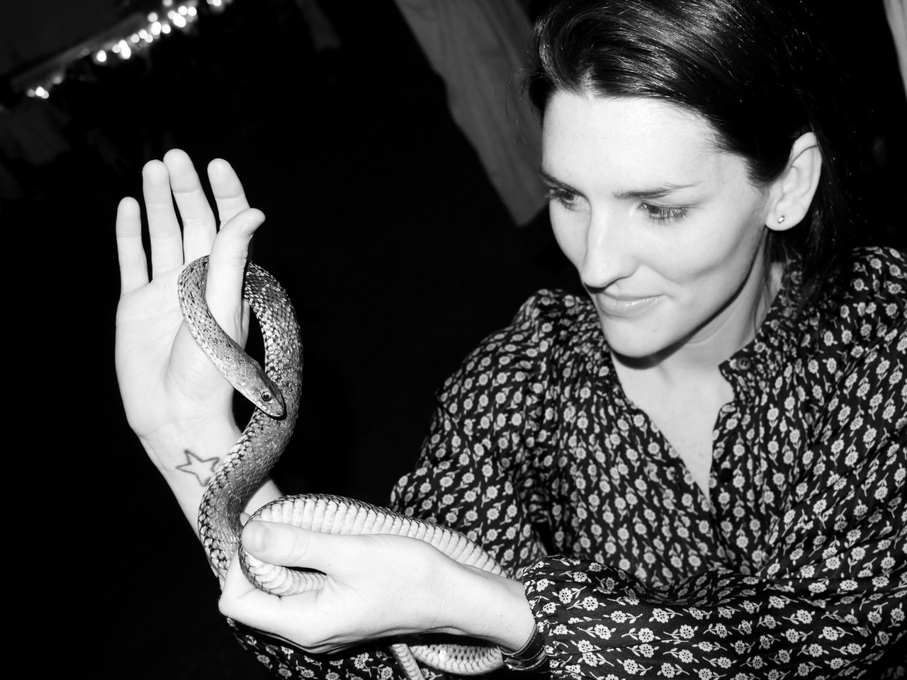 Photographer and Dossier’s editor Skye Parrott holding a snake in the ...