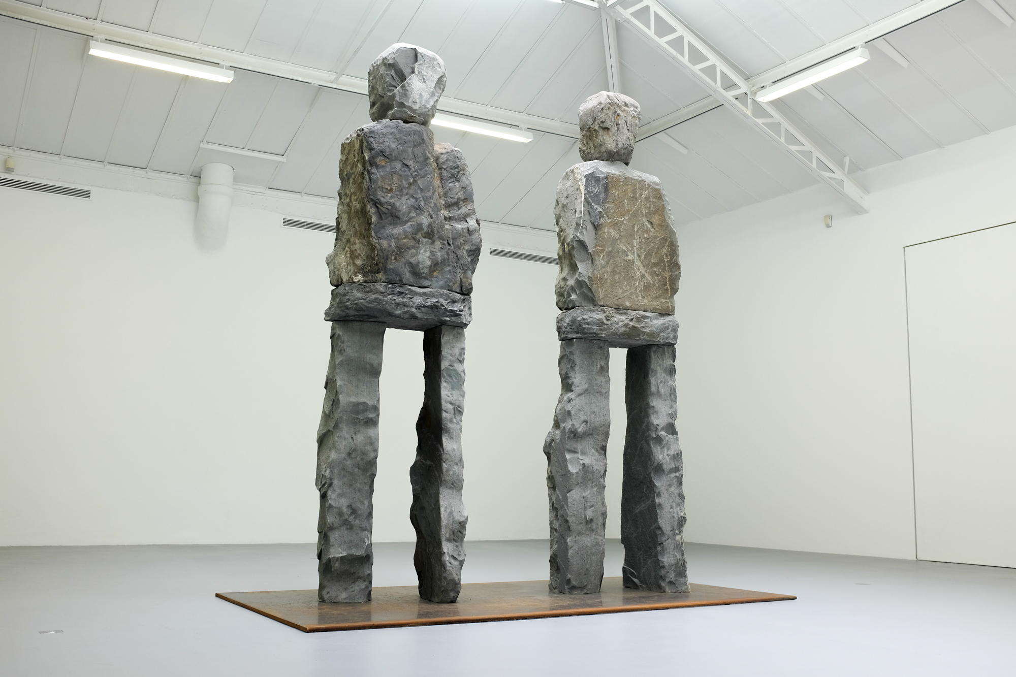 Ugo Rondinone's "A wall. Seven windows. Four people. Three trees. Some ...